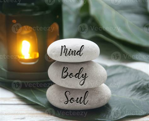 Mind Body And Soul Words Engraved On Zen Stones With Black Lamp