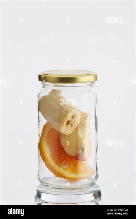Testing Bacteria And Mould Growth On Fruit Inside A Glass Jar Stock