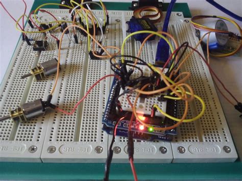 some dc motors step motors and micro servo lots of wires breadboards