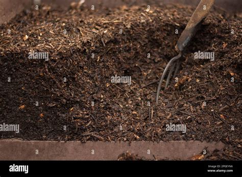 Mature Compost Ready To Use In Garden Produced In A Community Composter Placed In A Common Area