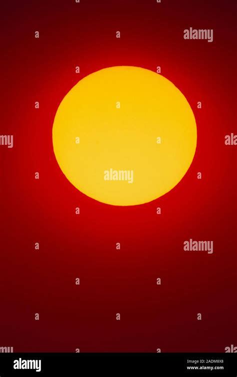 Sunset Disc Of The Sun At Sunset In A Reddened Sky Solar Radiation