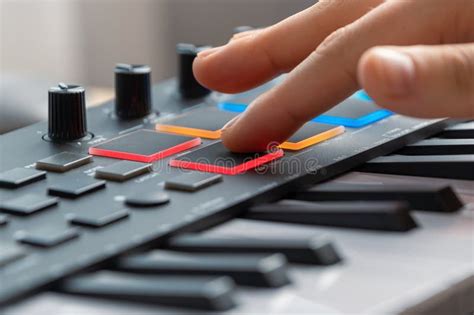 Woman Playing Midi Keyboard With Control Knobs And Pads Close Up Stock Image Image Of Hands