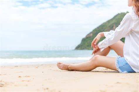 Young Woman Sitting Alone On The Beach At Island Travel Concept Stock Image Image Of Brunette