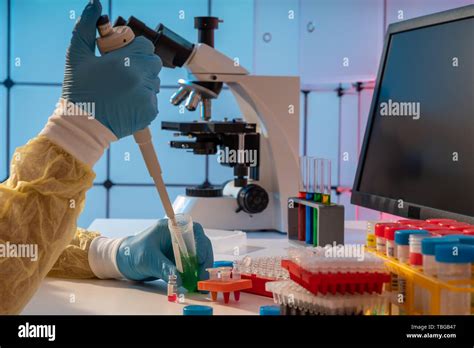 Scientific Experiment In Microbiological Lab Microscope And Test Tube