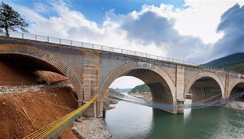 A Historical Masonry Arch Bridge Undergoing Seismic Retrofitting Premium Ai Generated Image
