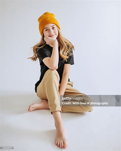 Cute European Teenage Girl In Casual Clothing On White Background