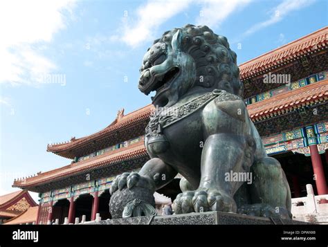 Traditional Guardian Lion Bronze Statue In Front Of Gate Of Supreme