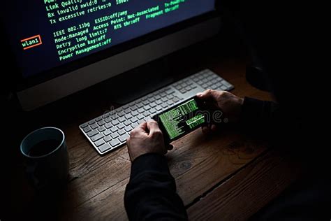 Smartphones Are A Willing Accomplice To Cyber Crime High Angle Shot Of An Unidentifiable Hacker
