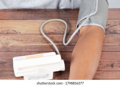 Mans Arm Doing Blood Pressure Measurement Stock Photo Shutterstock