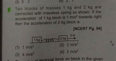 Two Blocks Of Masses 1 Kg And 2 Kg Are Connected With Massless Spring As