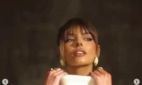 Maura Higgins Looked Stunning In A Cream Knit Gown That Highlighted Her Toned Figure And