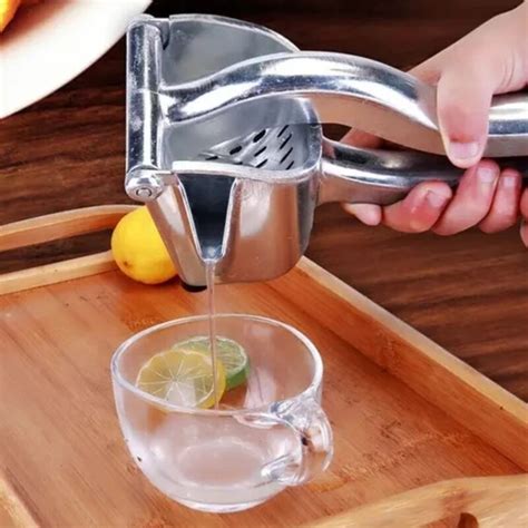 خرید و قیمت آب میوه گیری دستی آلومینیومی وارداتی سایز بزرگ آب انار گیری