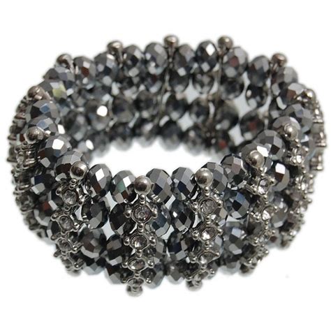 Красива гривна от декоративни стъклени камъни и бели камъчета на