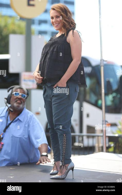 A Heavily Pregnant Alyssa Milano Appears On Extra And Receives A