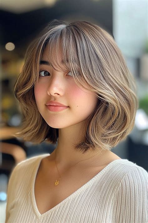 45 Chic Layered Bob Haircuts Soft Ash Blonde Bob With Wispy Bangs