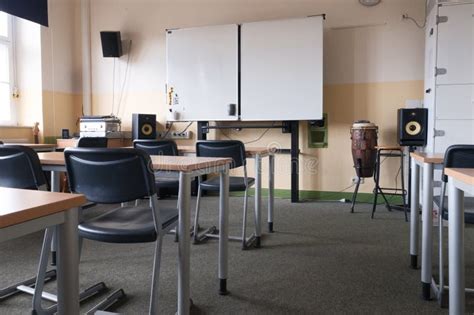 A Classroom Full Of Tables And Chairs Stock Image Image Of School Young 385099039