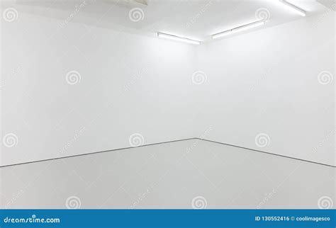 A View Of A White Painted Interior Of An Empty Room Or An Art Gallery