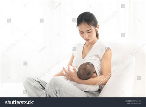 Asian Mother Breastfeeding Over 3 056 Royalty Free Licensable Stock