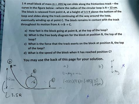 1a Small Block Of Mass M 035 Kg Can Slide Along The Frictionless Track