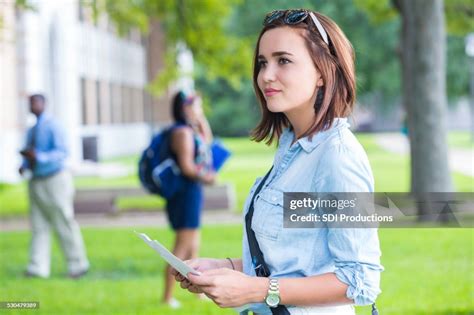 Cute College Coed Looking For Class On Beautiful Campus High Res Stock