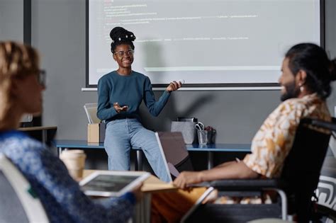 Premium Photo African American Coder Interacting With Colleagues