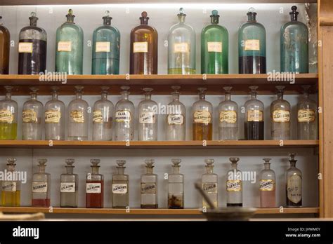 Shelves of medicine in glass bottles on display at the International ...