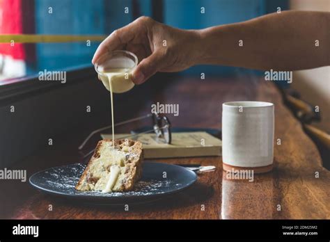 Dessert Pouring Custard On Table Hi Res Stock Photography And Images Alamy
