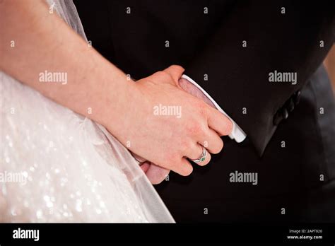 Bride And Groom At Marriage Hold Each Other Closeup Of Hands Stock Photo Alamy