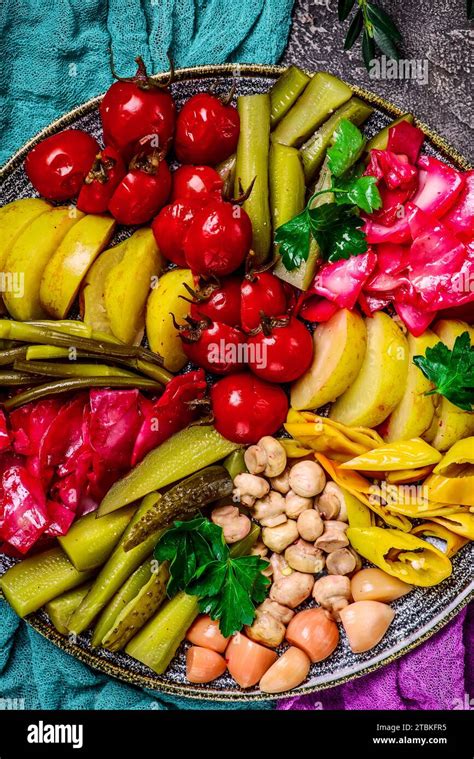Assorted Pickled Vegetables On A Large Platter Top Lective Focus