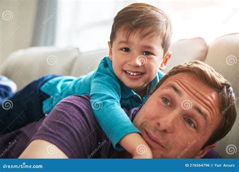 Daddy Time Is Happy Time An Adorable Little Boy And His Father Playing