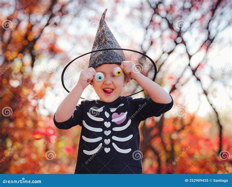 Young Girl In Black Costume Goes Trick Or Treating Stock Image Image