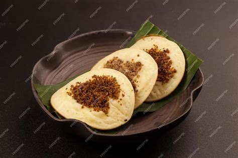 Premium Photo Serabi Or Surabi Or Sorabi Oncom Is Indonesian Traditional Pancake Topping With