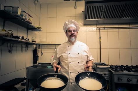 Professional Chef Making Pancakes Premium Photo