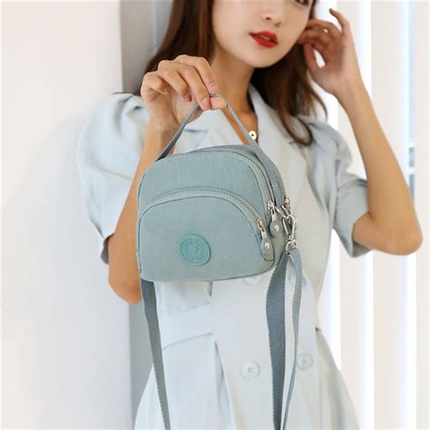 帆布包包2021日韩新款女斜挎包牛津布中年纯色妈妈包小包尼龙女包虎窝淘