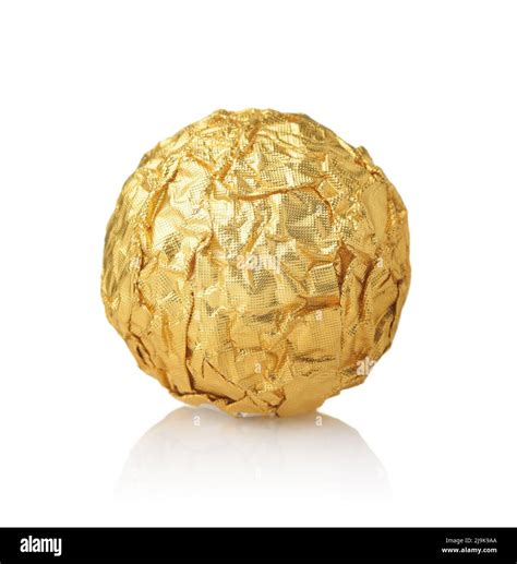 Front View Of Single Chocolate Ball Candy In Gold Foil Wrapper Isolated