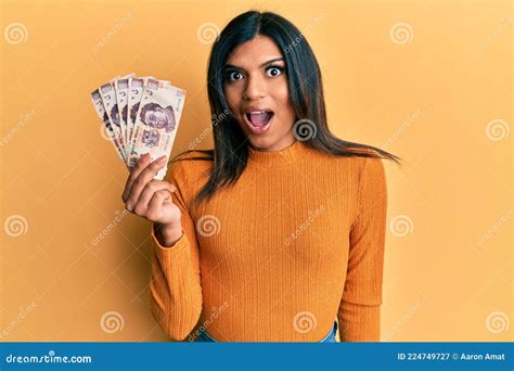 Young Latin Transsexual Transgender Woman Holding 500 Mexican Pesos