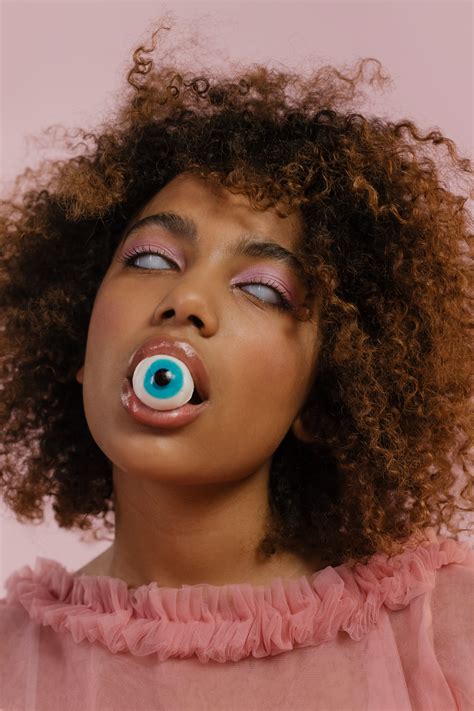 Girl With Brown Curly Hair And Blue Eyes