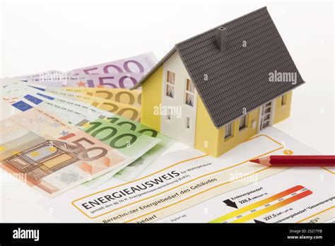 The Energy Performance Certificate For Detached Houses Austria With Red Pencil And Model House