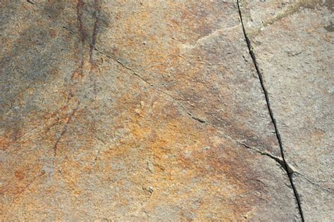 자연적인 돌 화강암 텍스처 화강암 패턴입니다 돌 배경 룩된 화강암 화성암 부엌 Worktops 등에 대 한 사용의 갈색 색조와 대리석의 표면입니다 미니 0명에 대한 스톡