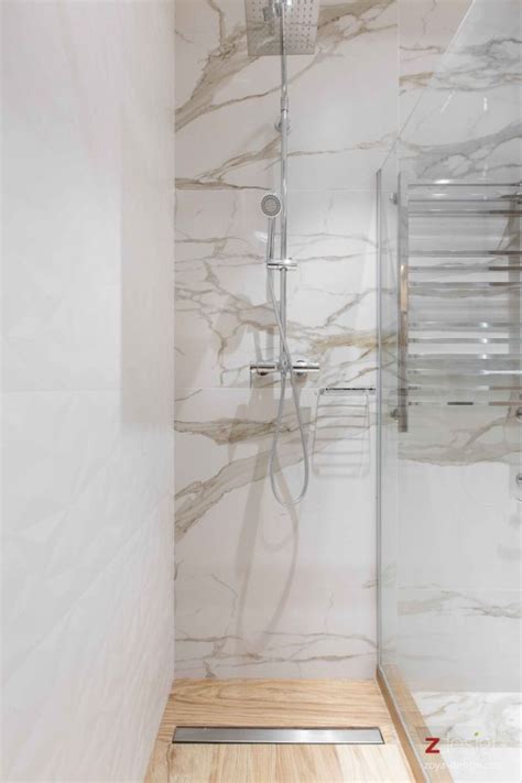 Санузел ванная комната однушка ЖК Сердце столицы 47 кв м Керамогранит под мрамор Калакатта и