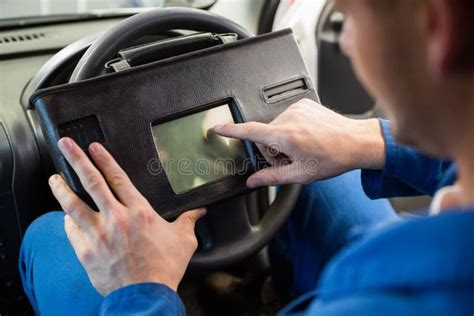 Using Diagnostic Car Code Reader To Erase Error Codes And Turn Off Check Engine Light Stock