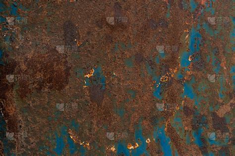 生锈的铁纹理和蓝色油漆。锈作为背景