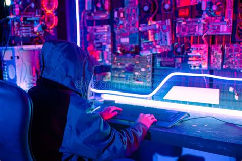 Woman Hacker Asian Wearing Hood Typing Keyboard Coding Hacking Stock