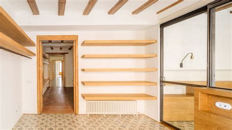 Nook Architects Uncovers Original Tiles And Timber Beams In Barcelona Flat