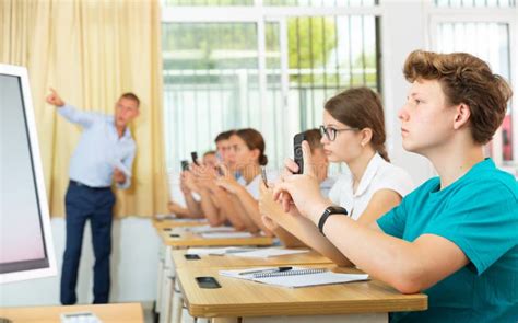 Teen Babe With Asian Girl Classmate Checking Test Results Stock Image Image Of People