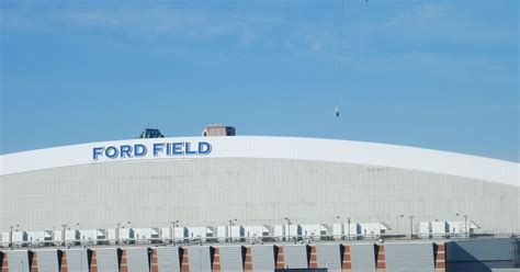 Helicopter Hauls Dozens Of Barrels As Lions Begin Ford Field Roof