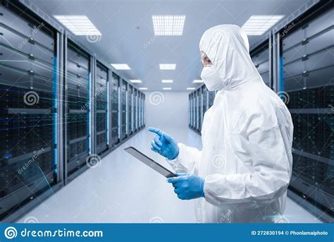 Programmer Or Engineer With Notebook In Server Room Stock Photo Image