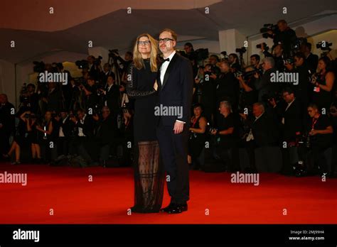 James Gray And Alexandra Dickson Gray Pose For Photographers Upon