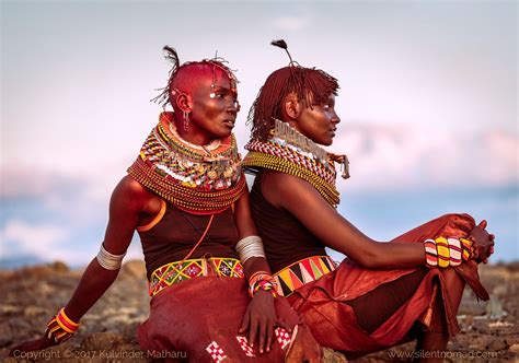 Two Turkana Women In Red Silent Nomad