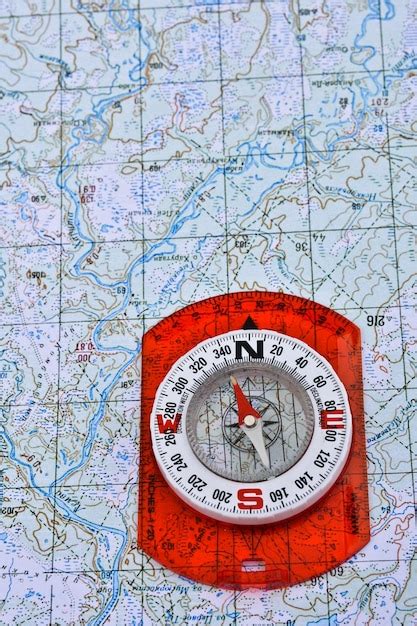 Premium Photo Map And Compass